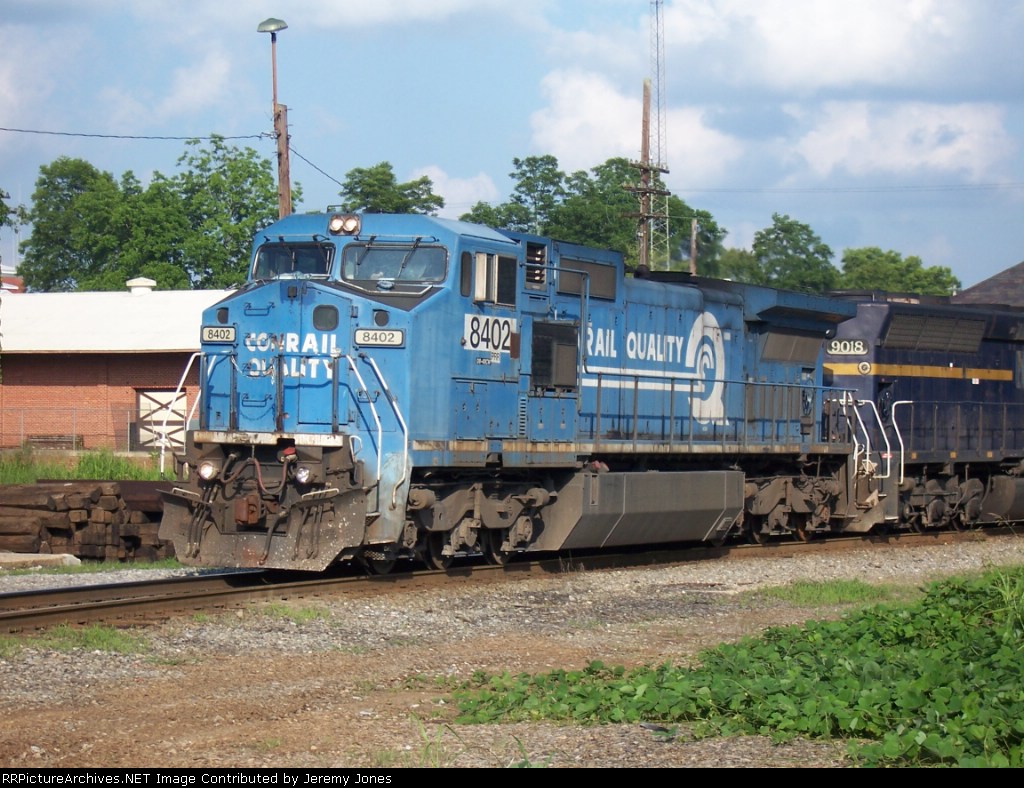 NS 8402 leads a westboud train.